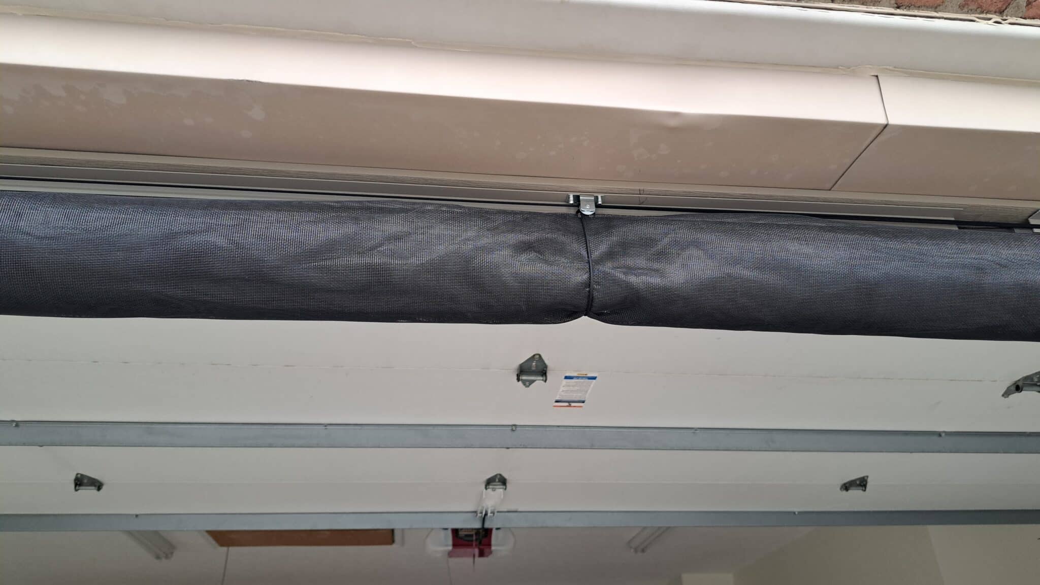 Retractable Garage Door Screen with Aluminum Frame | Zip-Roll